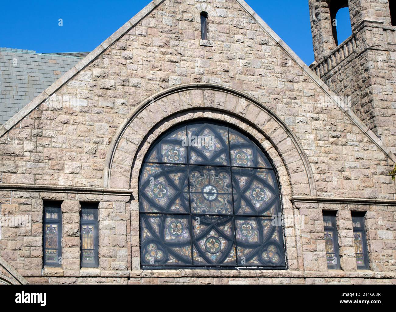 An aerial view of a religious building, featuring the front facade of ...
