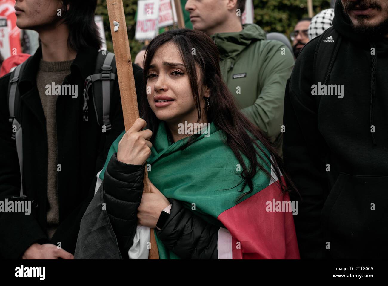 Dublin, Ireland. 13th Oct, 2023. A young woman seen crying during the ...