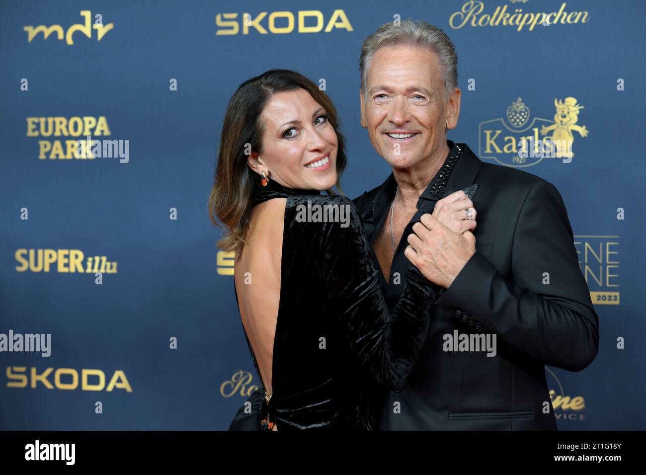 Leipzig, Germany. 13th Oct, 2023. Pop singer Olaf Berger and his wife ...