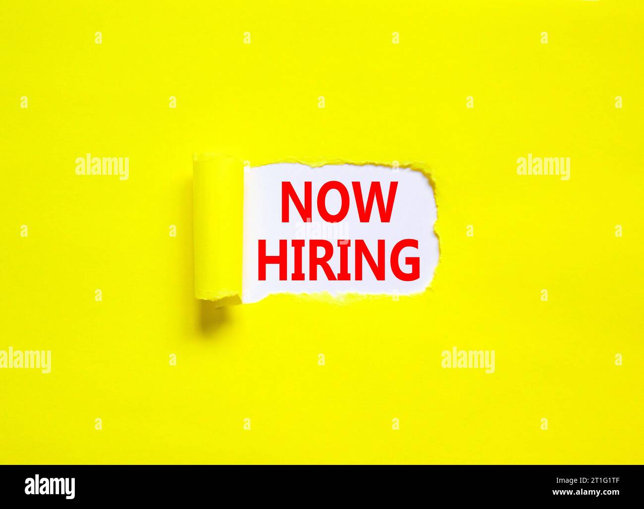 Now hiring symbol. Concept words Now hiring on beautiful white paper ...