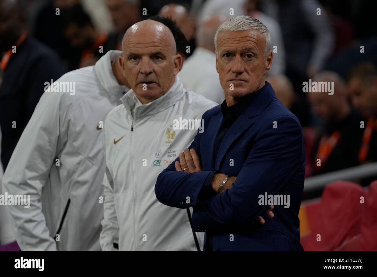 France head coach Didier Deschamps, right, looks at the field before ...