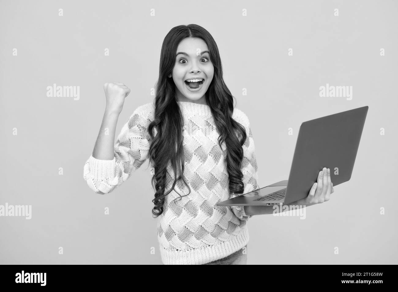 Excited face. Back to school, Teenager school girl with laptop computer ...