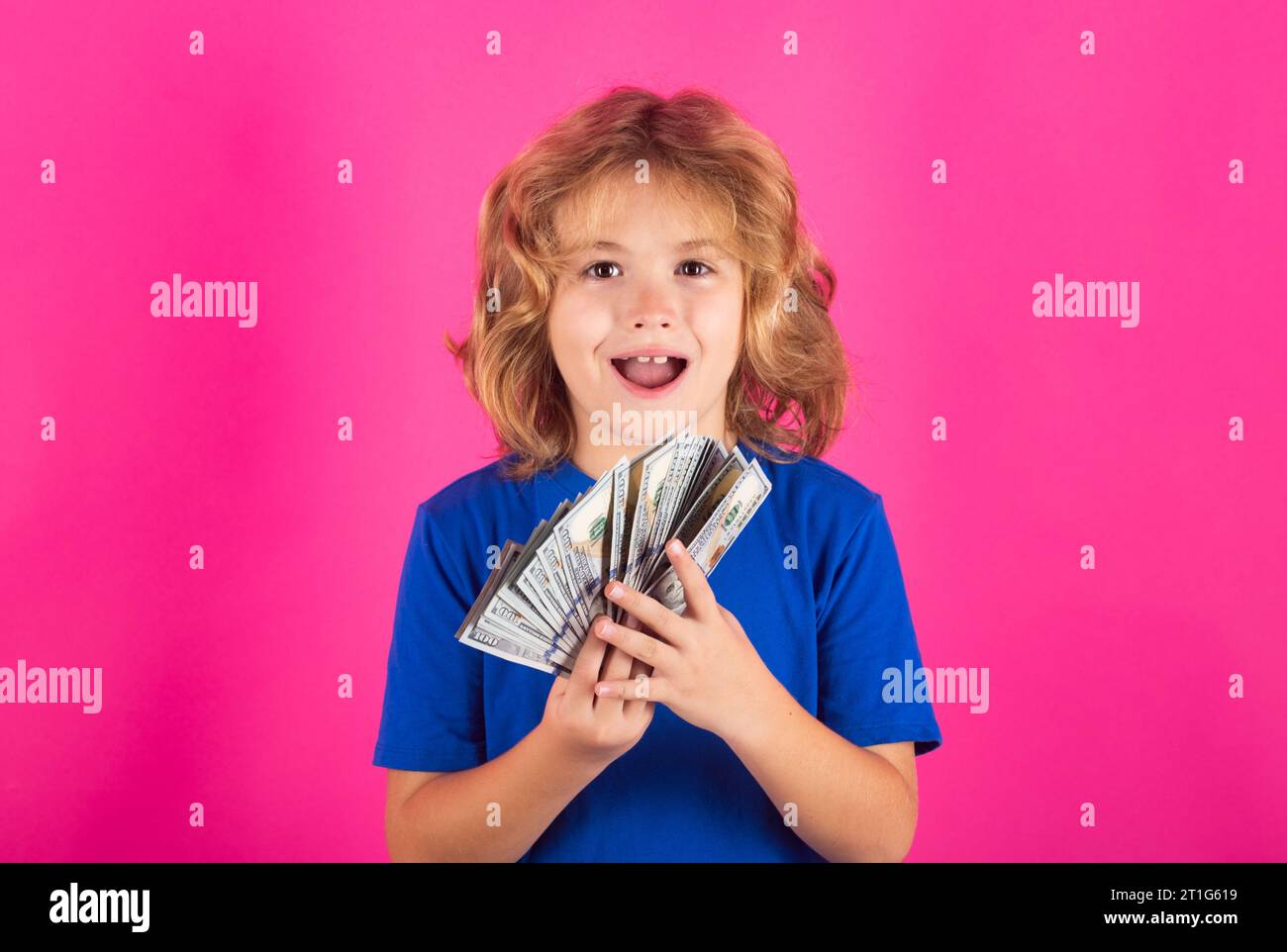Money win, big luck. Child with money dollar bills, standing dreamy of ...