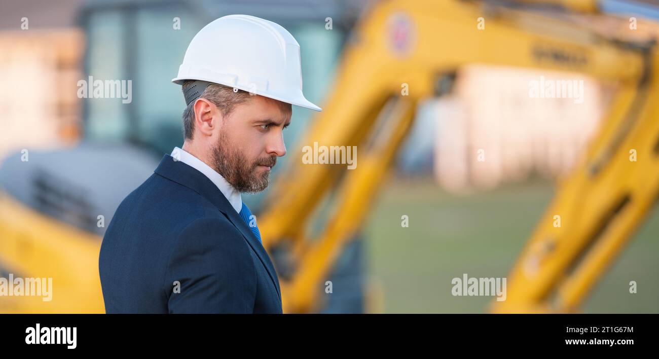 Worker in suit and helmet. Investor civil engineer, construction ...