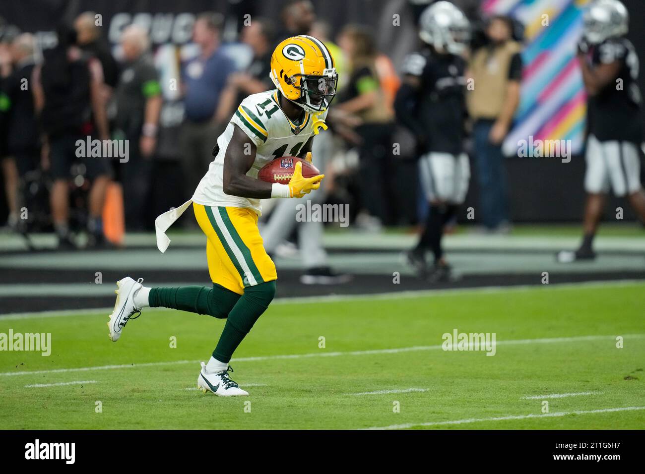 Green Bay Packers wide receiver Jayden Reed (11) warms up before an NFL ...
