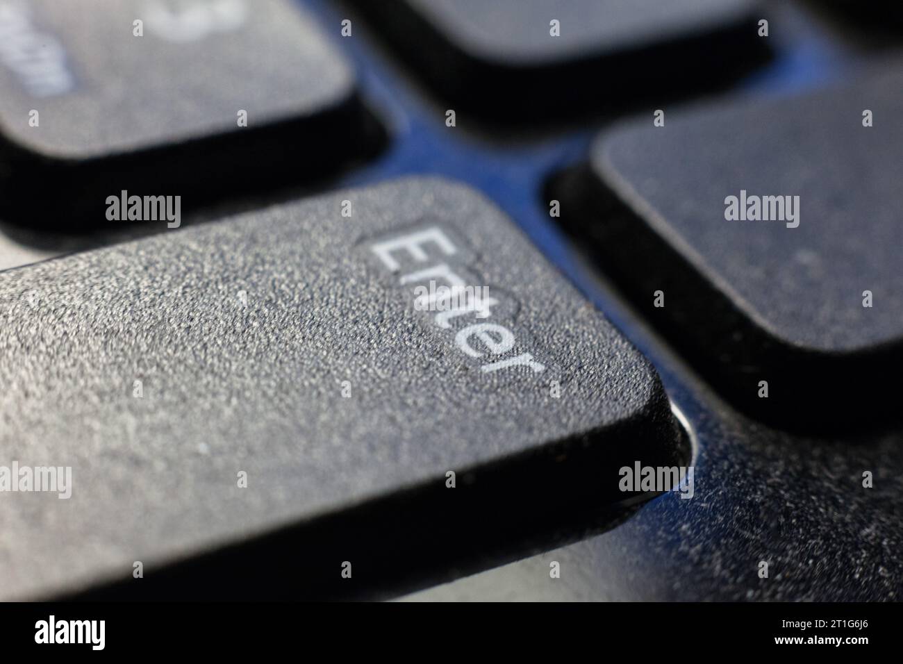 A close-up shot of an Enter key on a keyboard Stock Photo - Alamy