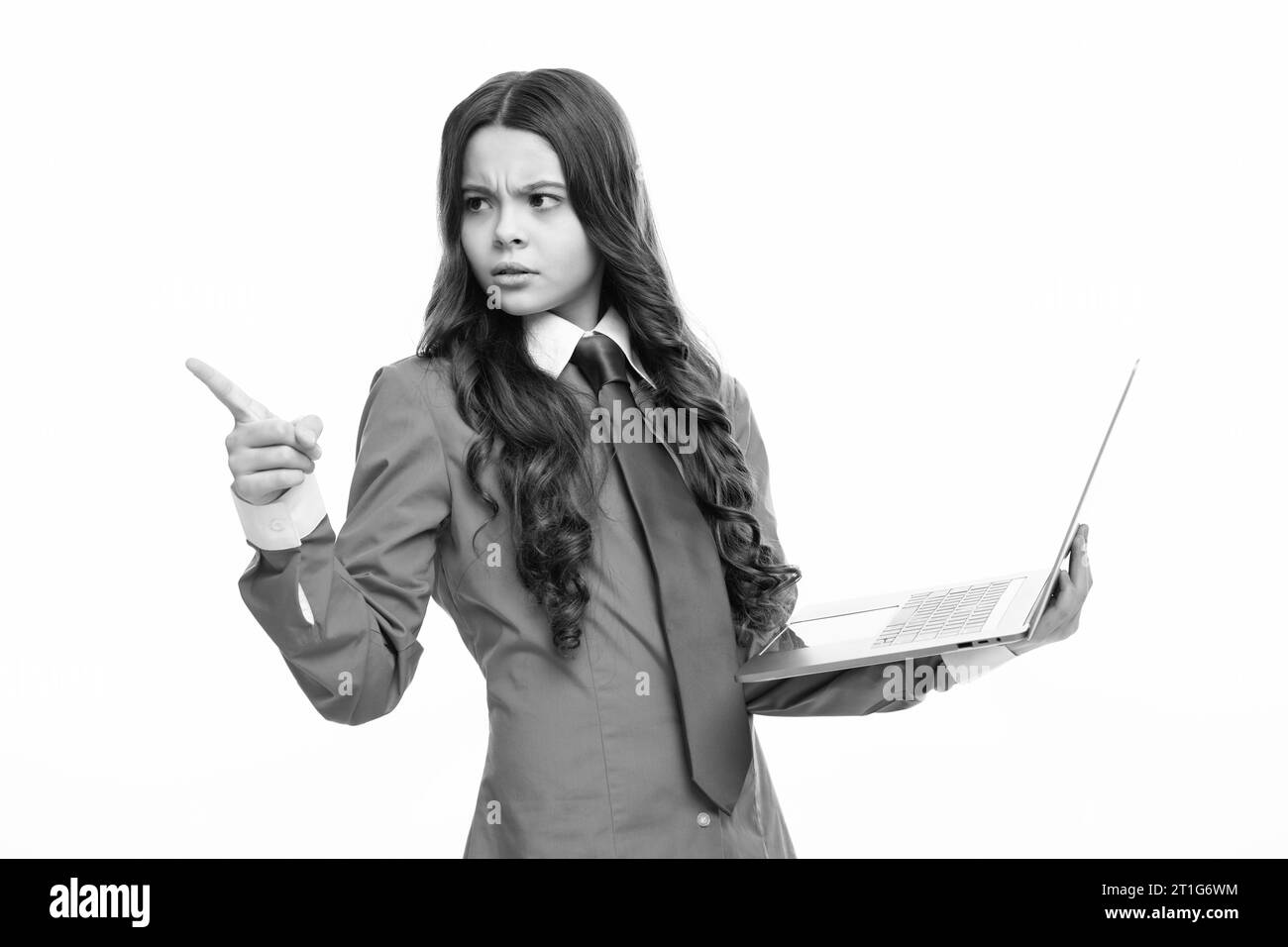 Young girl student hold computer. Funny pupil with laptop isolated on ...
