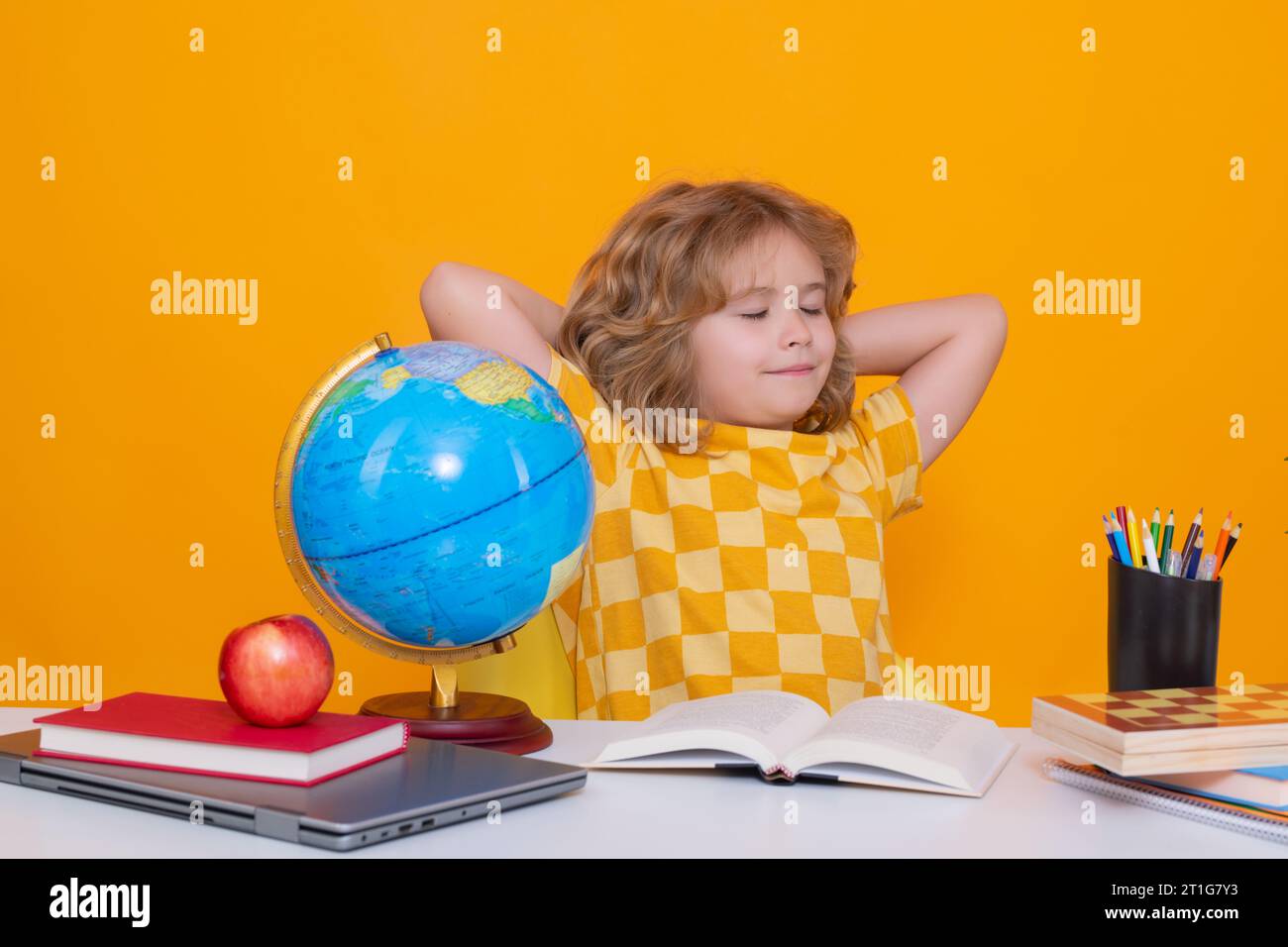 School and kids. Cute blonde child with a book learning. Knowledge day ...
