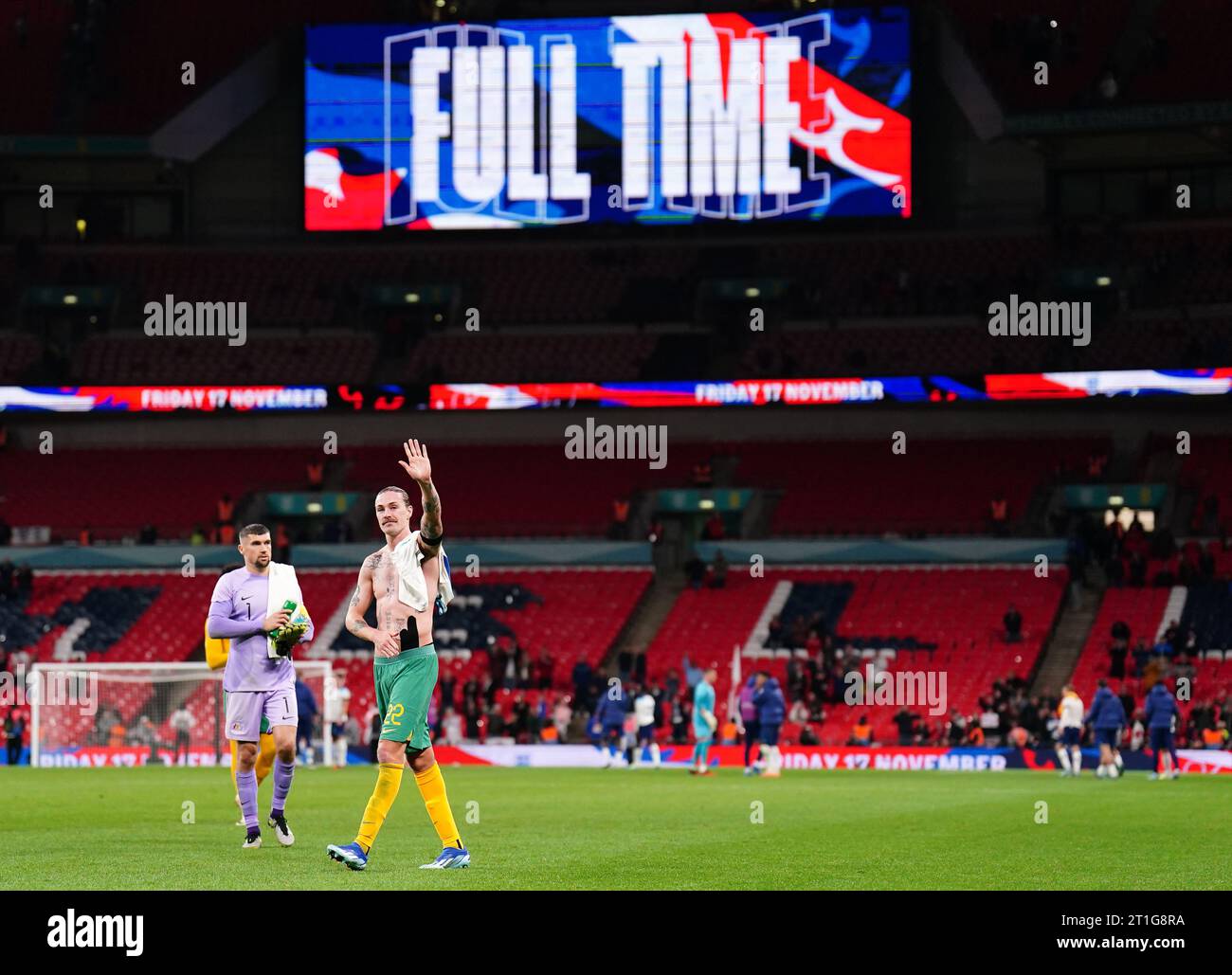 Australia goalkeeper Mathew Ryan and Jackson Irvine salute the fans ...