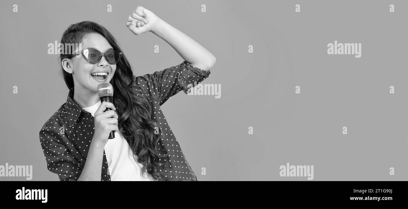 happy teen girl singer blogging online with selfie led and microphone ...