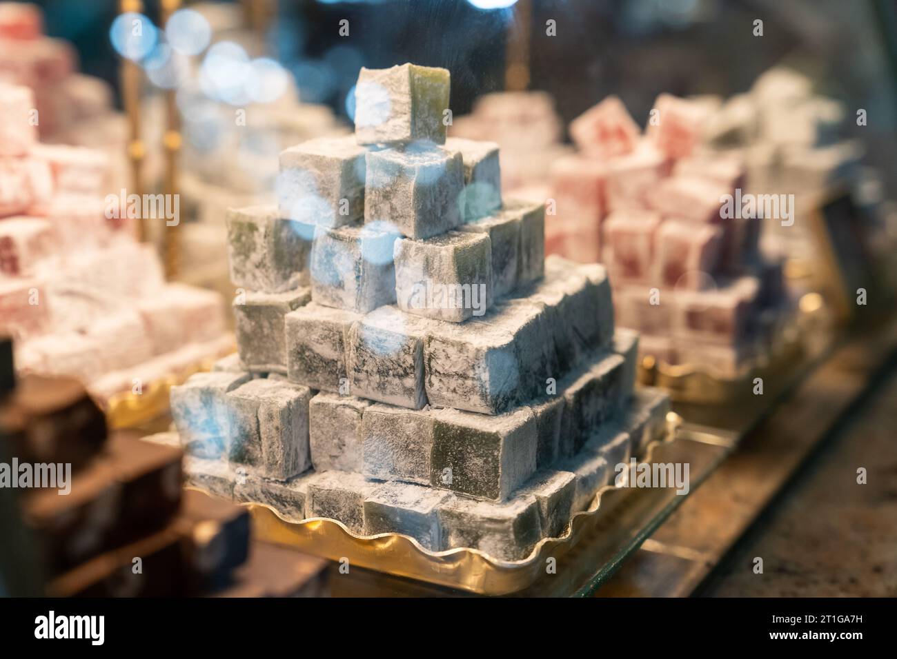 Turkish delight behind glass of restaurant window. Variety of delicious ...