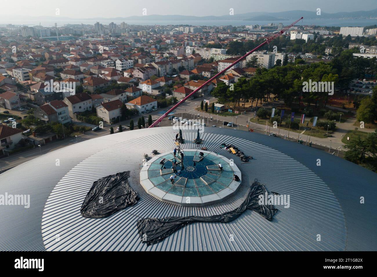 Croatia, Zadar, 131023. Maintenance work on the glass dome of the Kresimir Cosic hall in Visnjik ...
