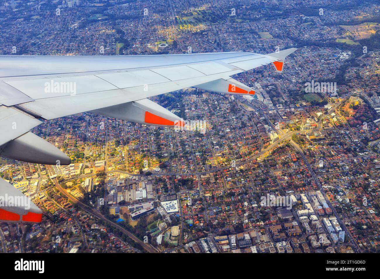 Airplane flying over Sydney West suburbs of Ryde from altitude over ...
