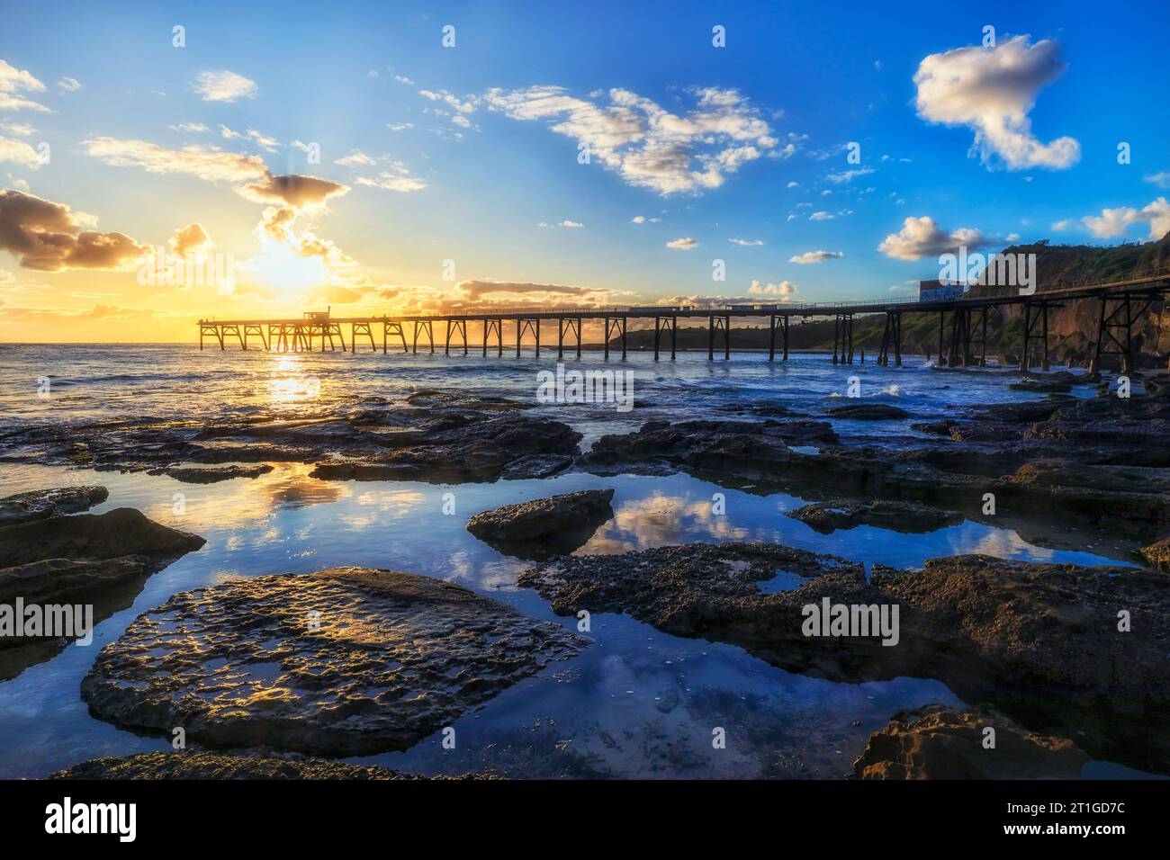 Calm reflective waters on Middle camp beach of Australia on Pacific ...