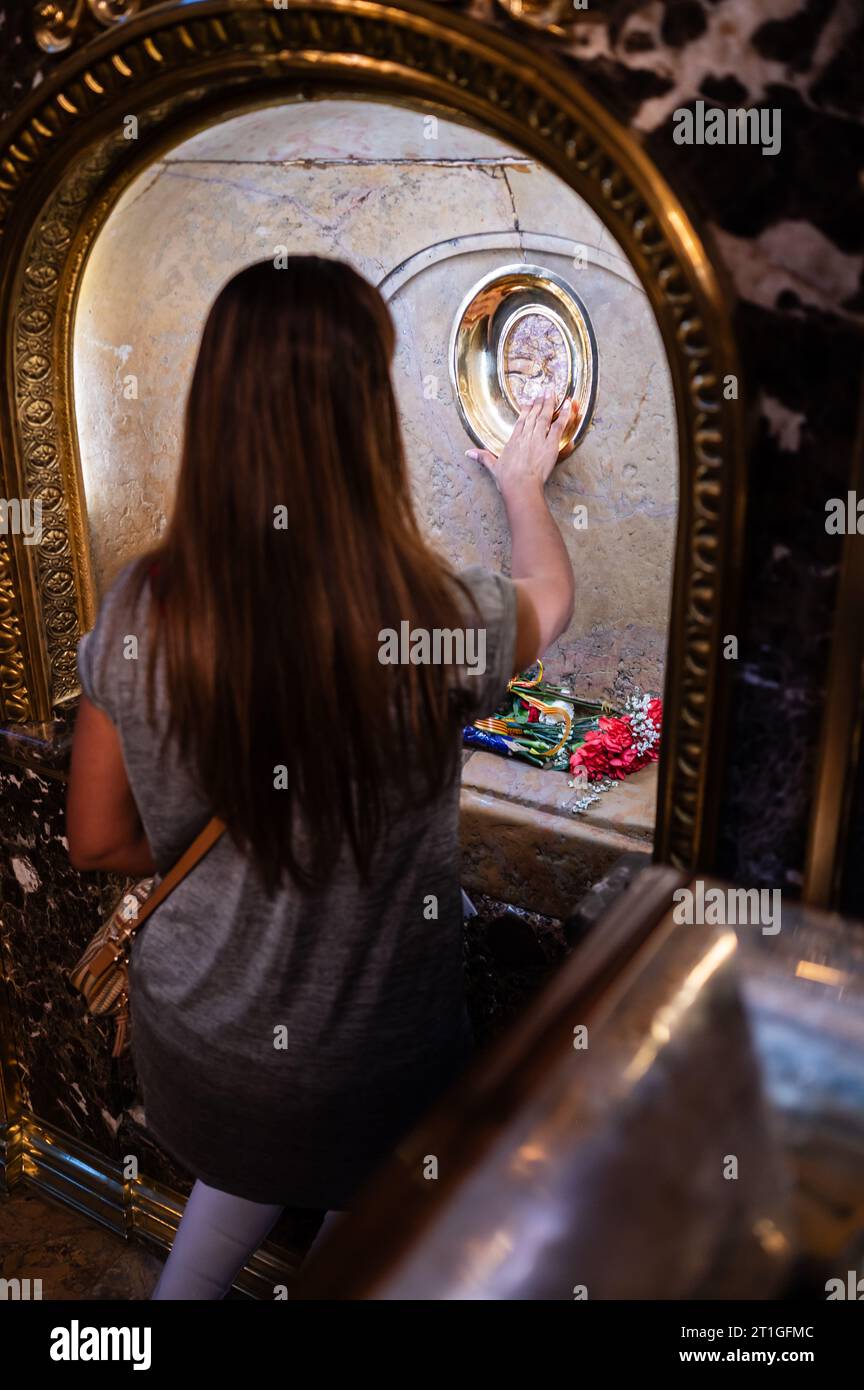 Worshipers kissing the pillar inside the Cathedral-Basilica of Our Lady ...
