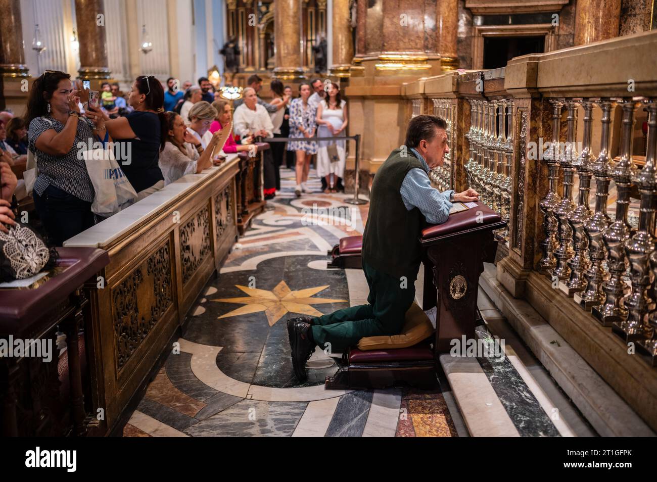 Believers inside the Cathedral-Basilica of Our Lady of the Pillar ...