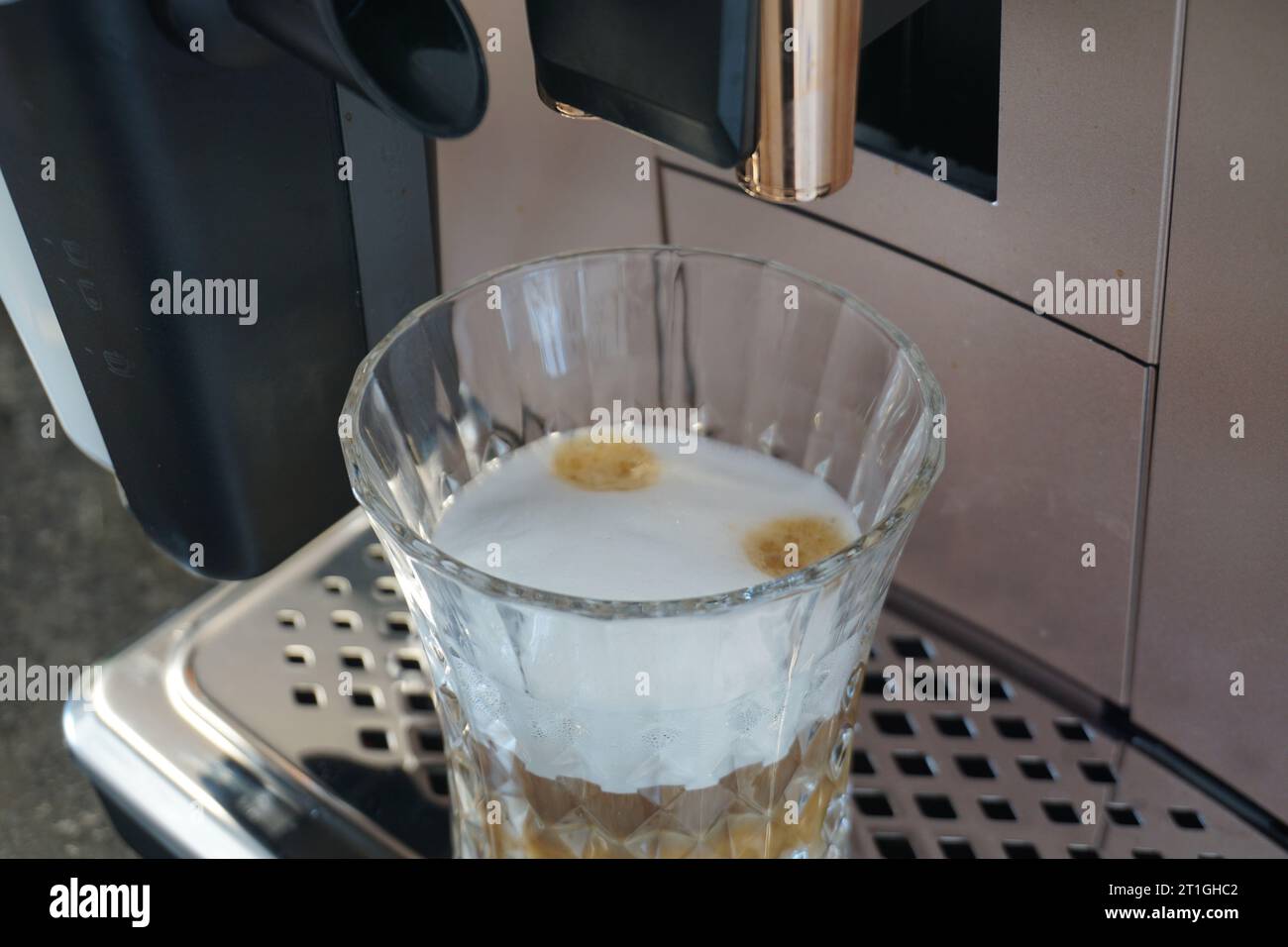 coffee in the coffee machine. Delicious coffee prepared in the coffee ...