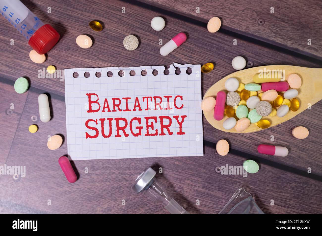 Grey stethoscope and paper plate with a sheet of white paper with text ...