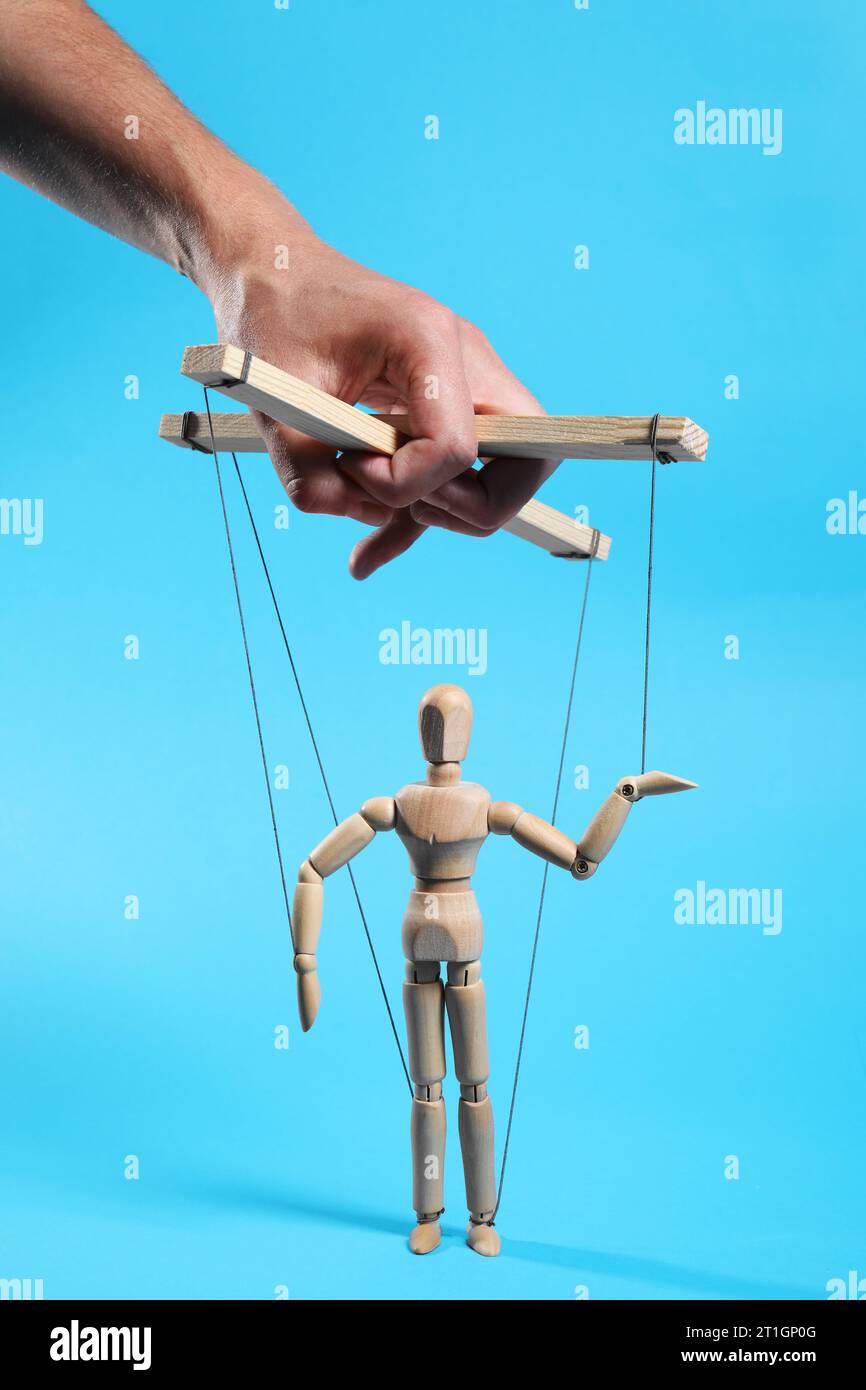 Brain with puppet strings hi-res stock photography and images - Alamy