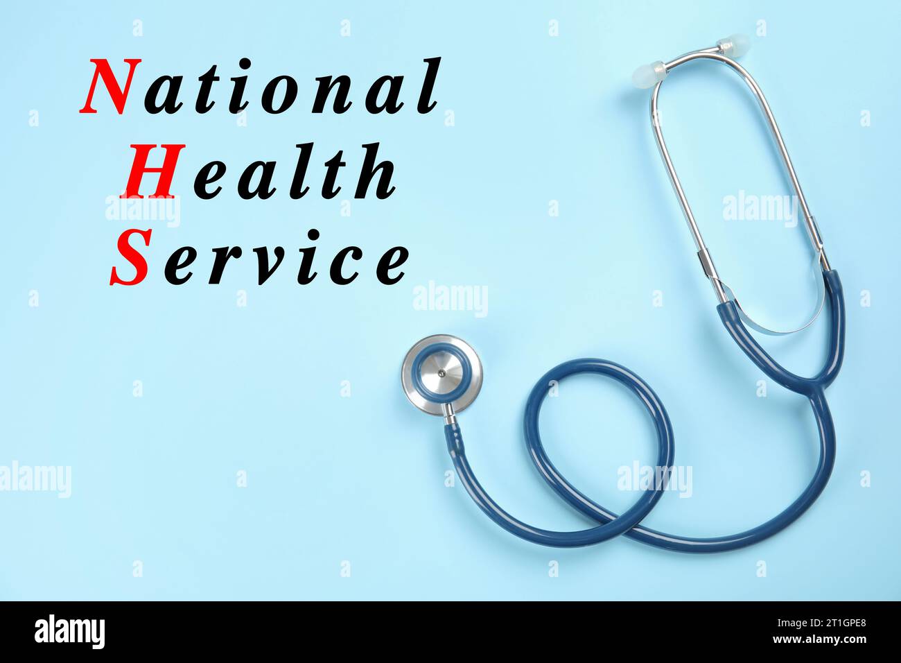 National health service (NHS). Stethoscope and text on light blue ...