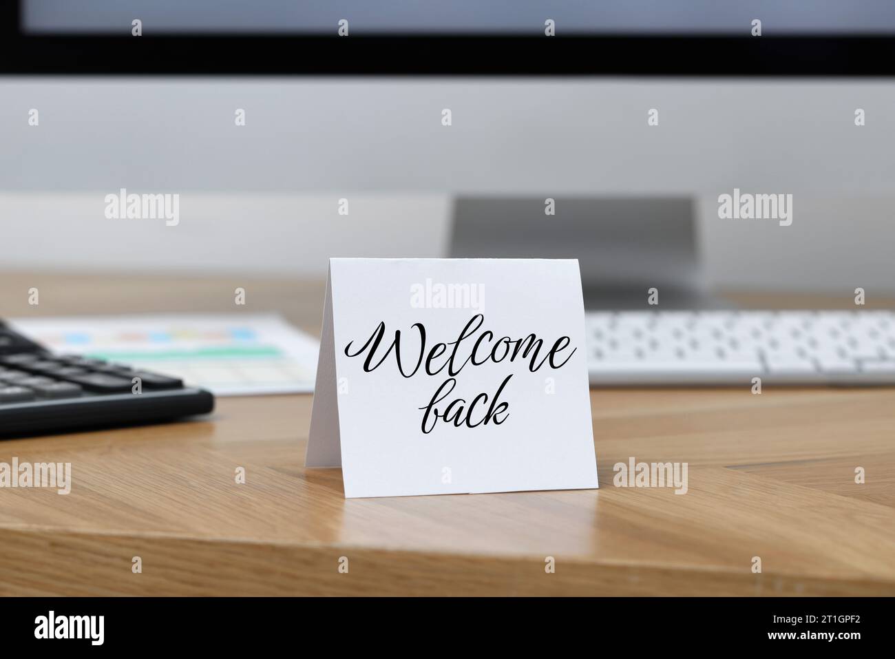 Paper note with phrase Welcome Back on office desk Stock Photo - Alamy
