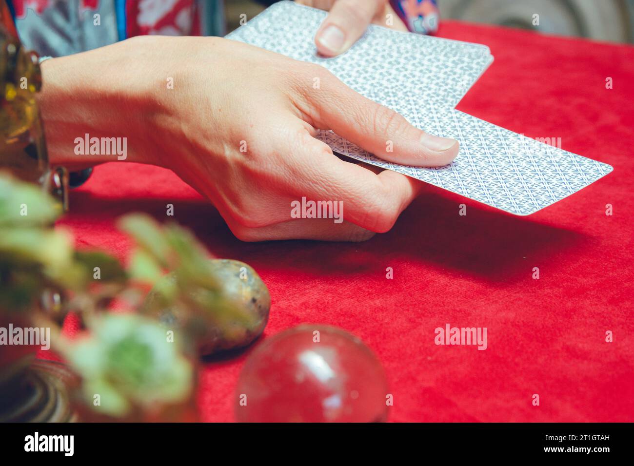 profile view of female hand of unrecognizable caucasian woman placing ...