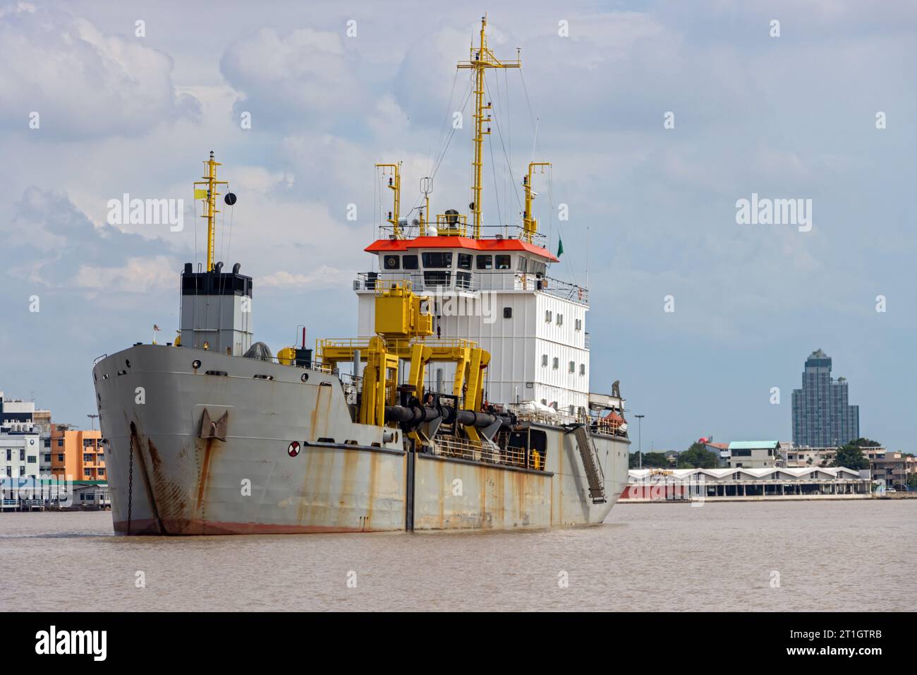 Trailing suction hopper dredger at entrance the Chao Phraya River ...
