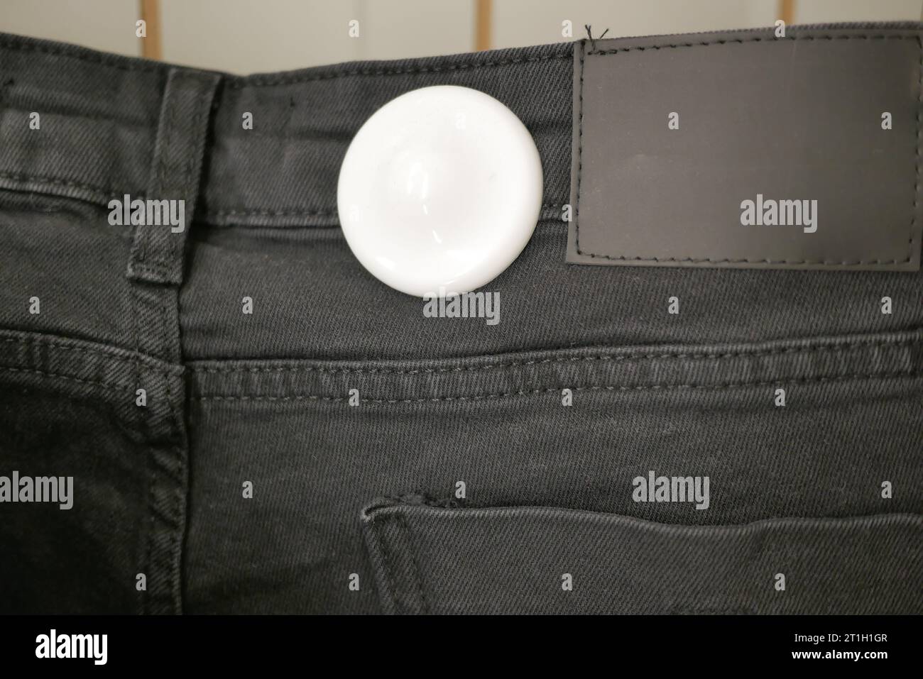 Security tags on clothes hi-res stock photography and images - Alamy