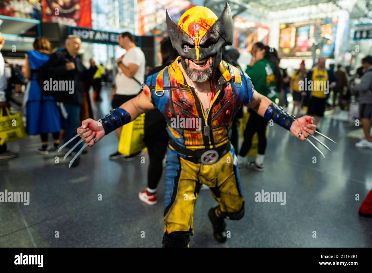 An attendee dressed as Wolverine poses during New York Comic Con at the ...