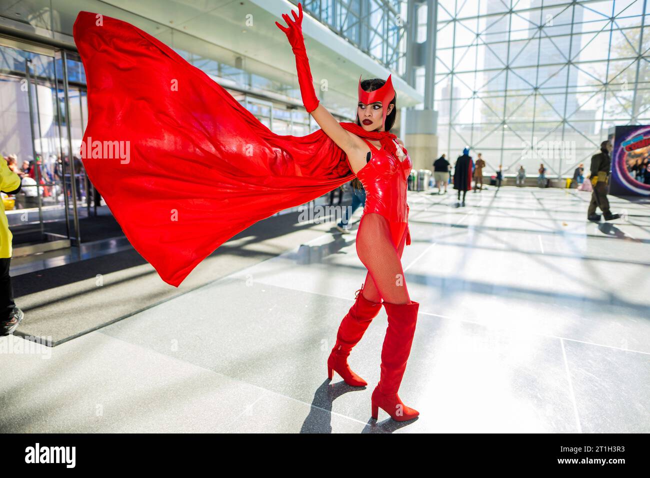 An attendee dressed as Marvel Comic's Scarlet Witch poses during New ...