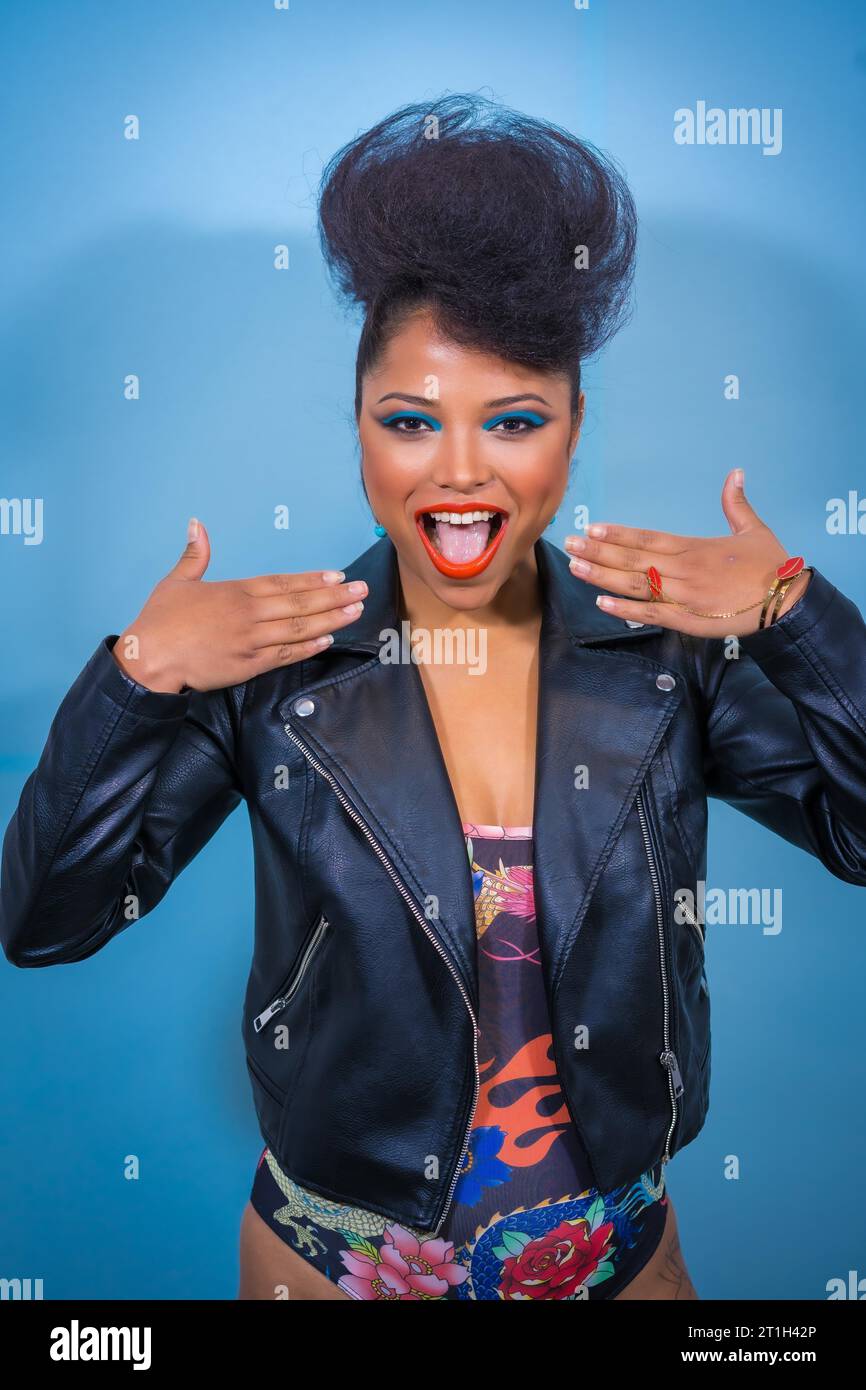 A closeup portrait of a fashion attractive rocker style woman with ...
