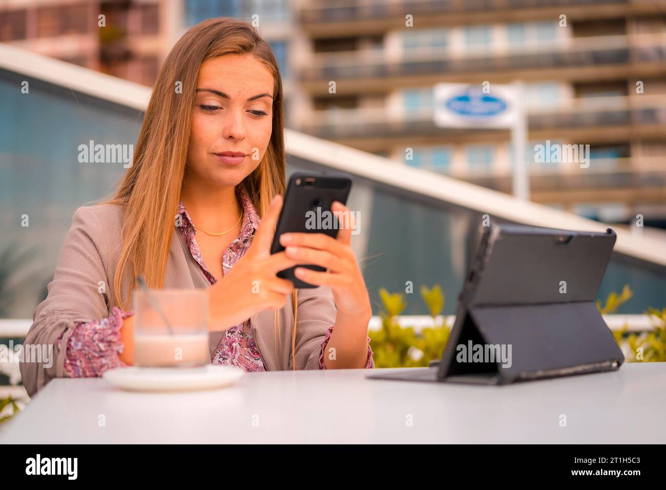 Executive blonde woman, businesswoman having a coffee decaffeinated ...