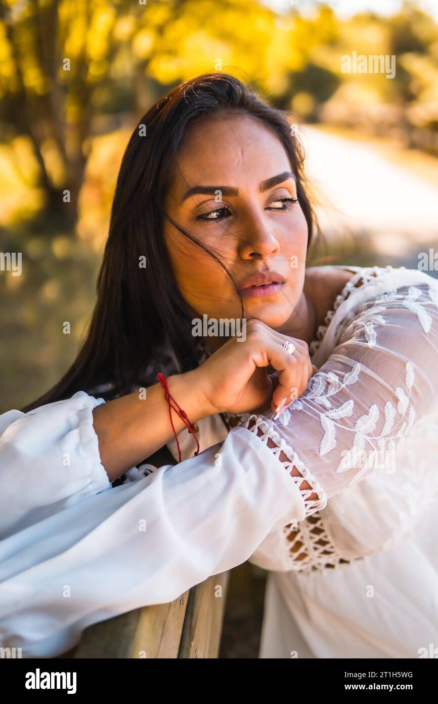 Mexican woman sitting on bench hi-res stock photography and images - Alamy