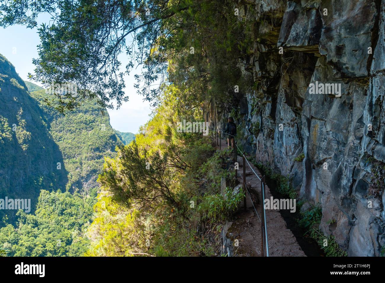 Trekking path next to the waterfall in the Levada do Caldeirao Verde ...