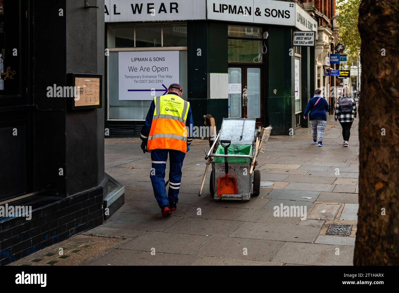 London, England, 07th Oct. 2023: A worker is cleaning the streets early ...
