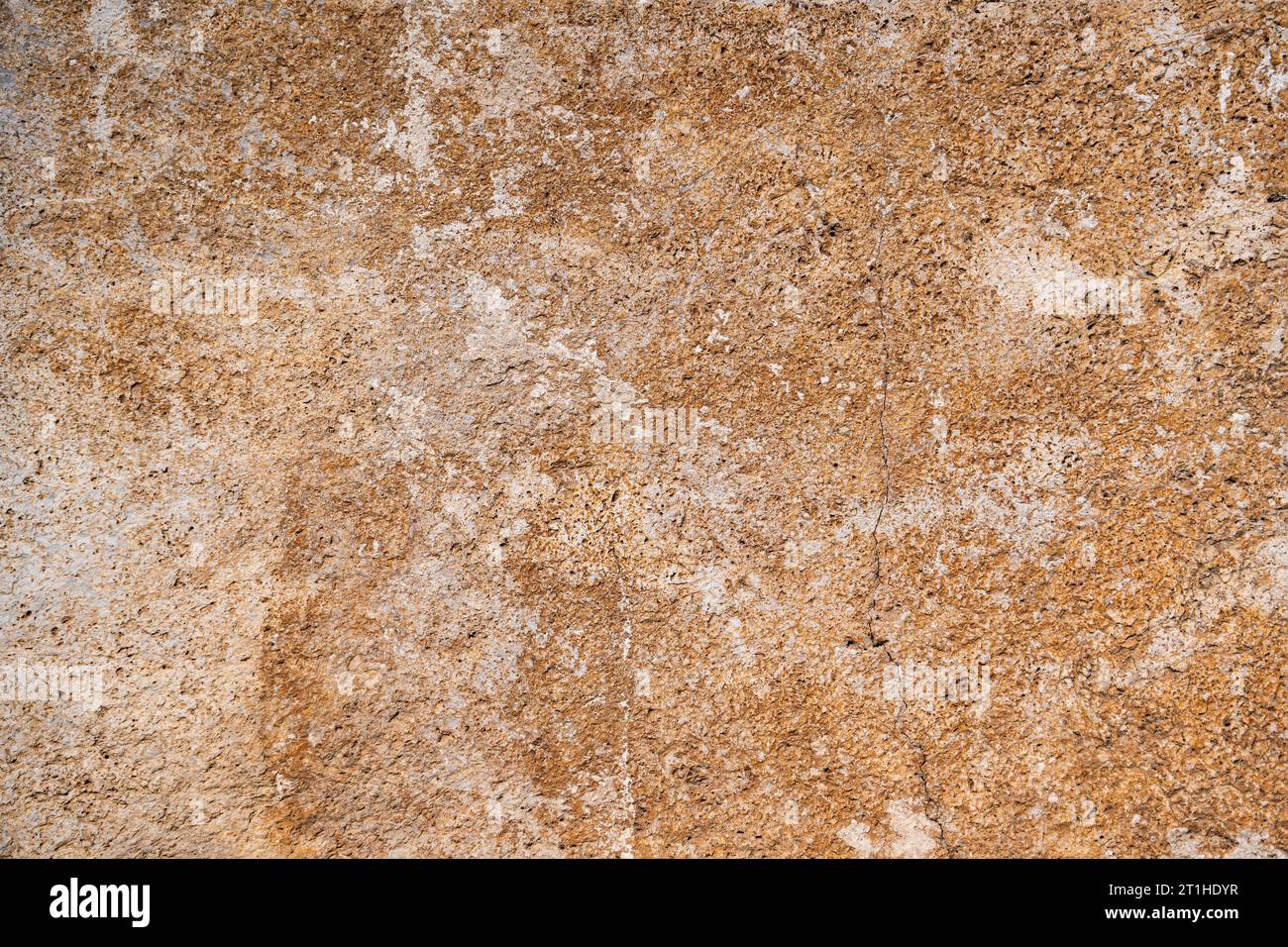 Texture of an ancient stone slab on the wall of the Cave of the ...