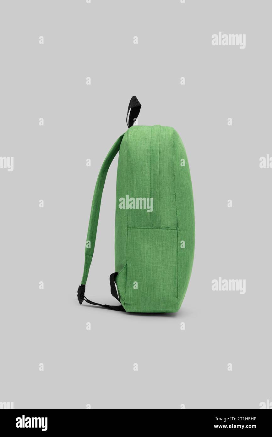 close up trendy fashionable school backpack green color isolated on ...