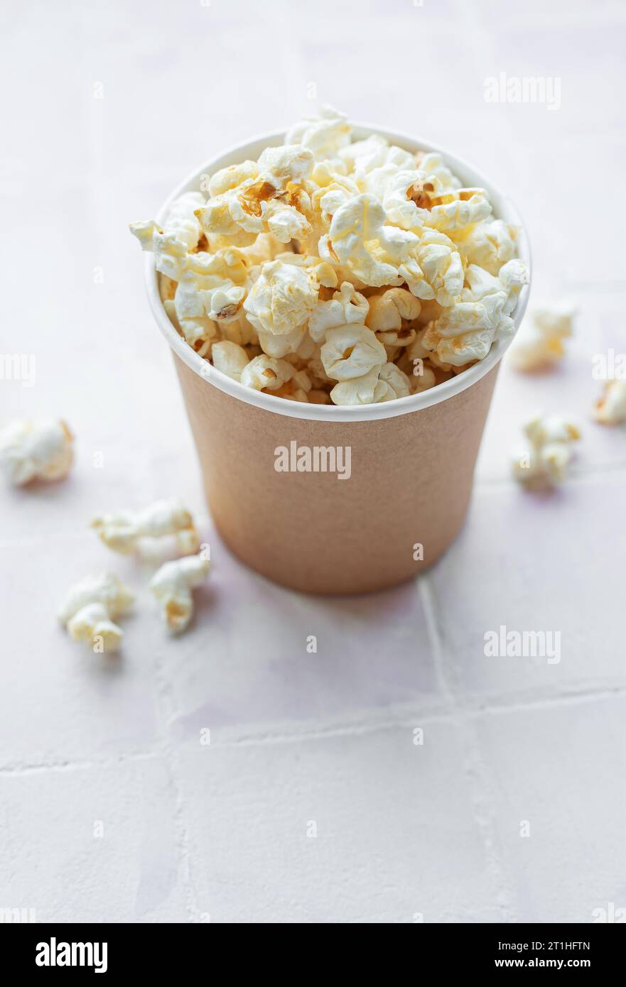 Popcorn paper bucket on white background Stock Photo - Alamy