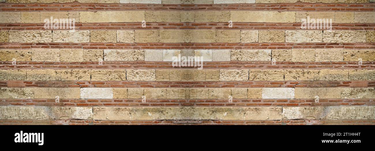 Sturdy yellow and beige cut stone brick wall, good for backgrounds ...