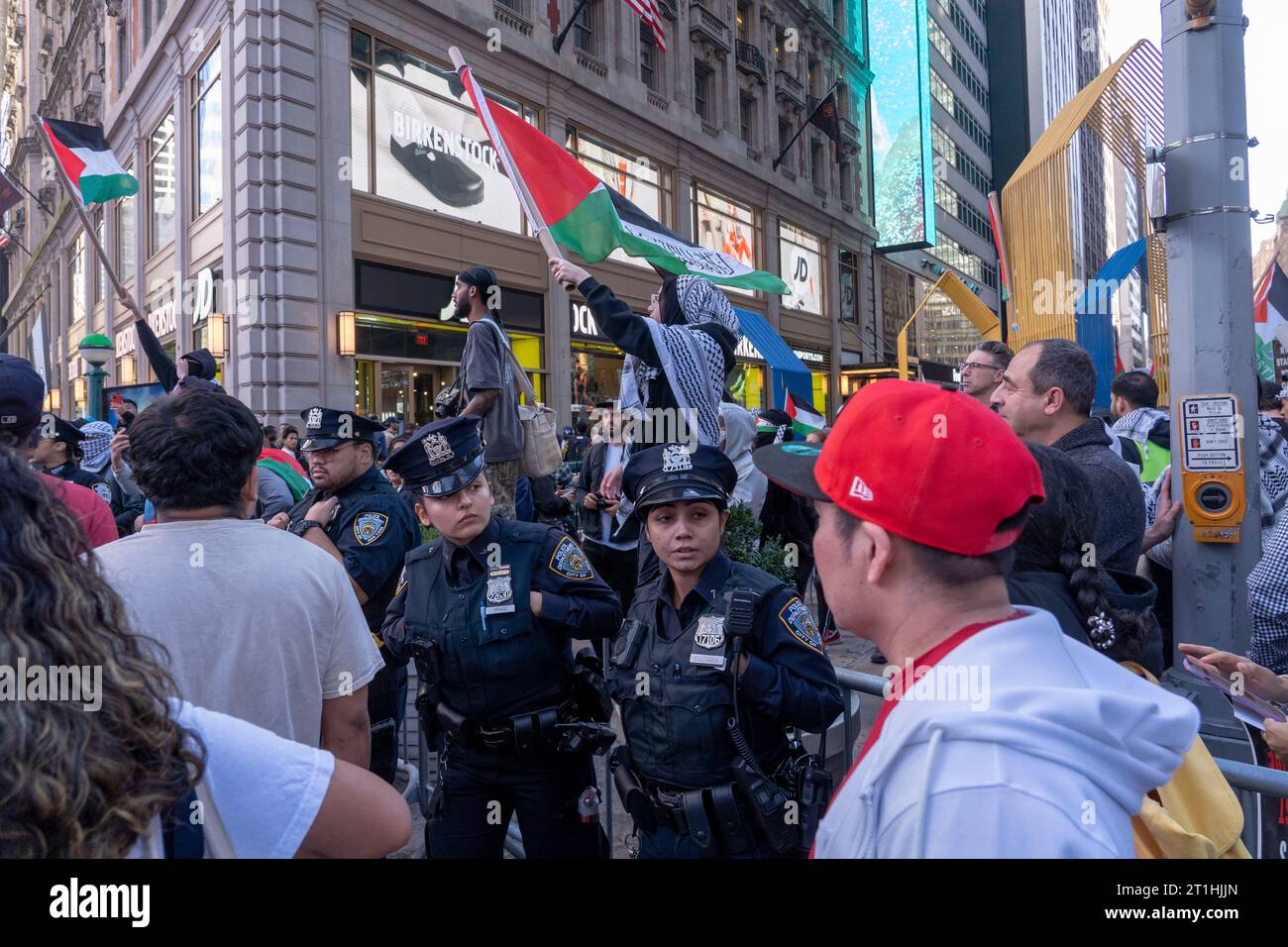 New York, United States. 13th Oct, 2023. Police stand guard during a ...