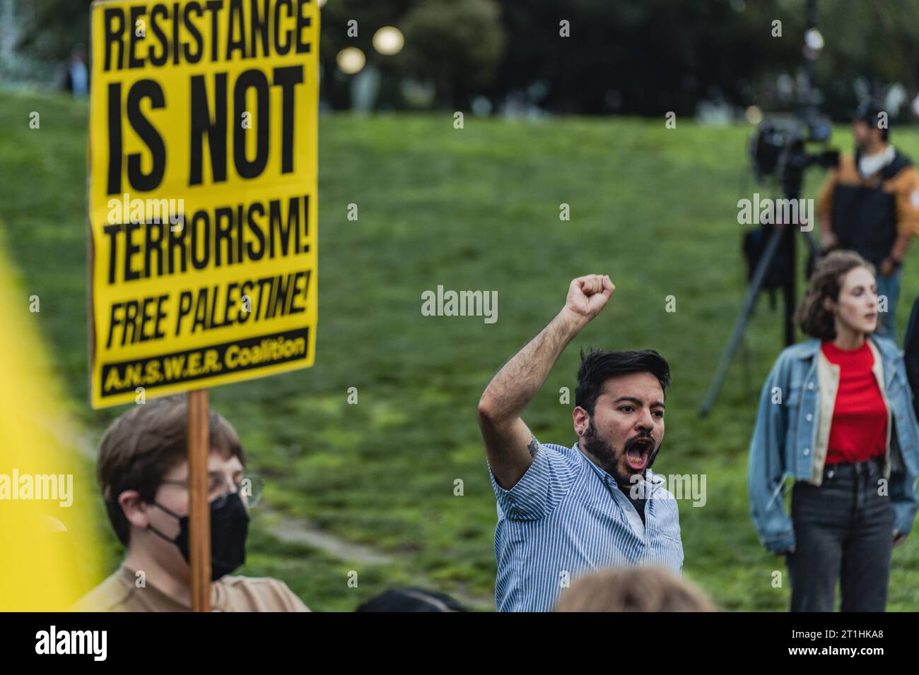 A protester chants slogans during a demonstration in solidarity with ...