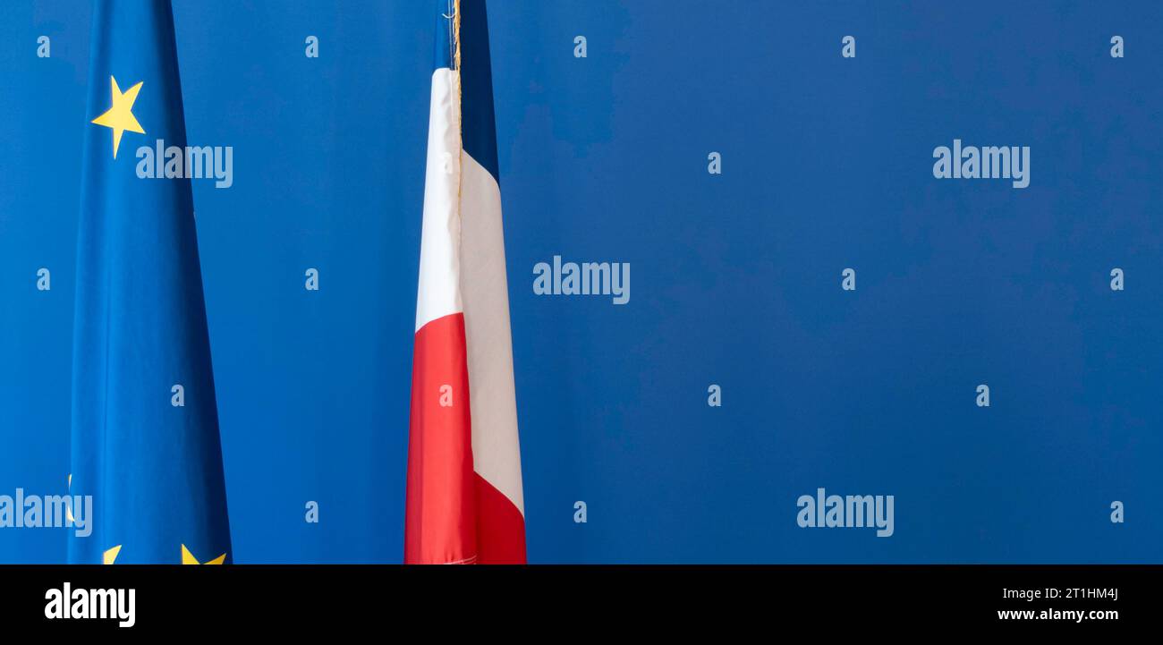 French and European flags on a plain blue background Stock Photo - Alamy