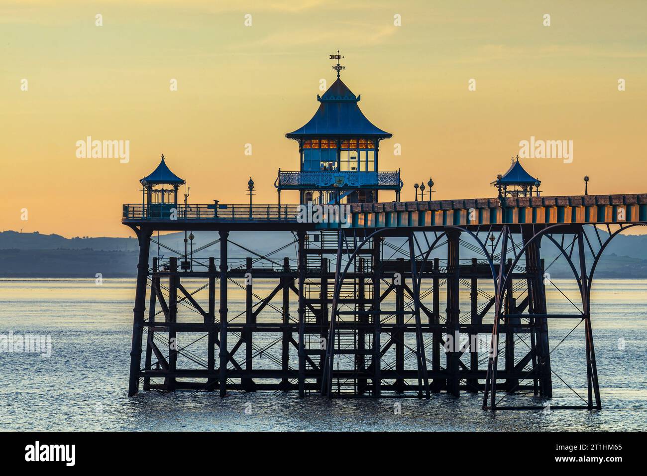 Pier side panels catching some sunlight Stock Photo - Alamy