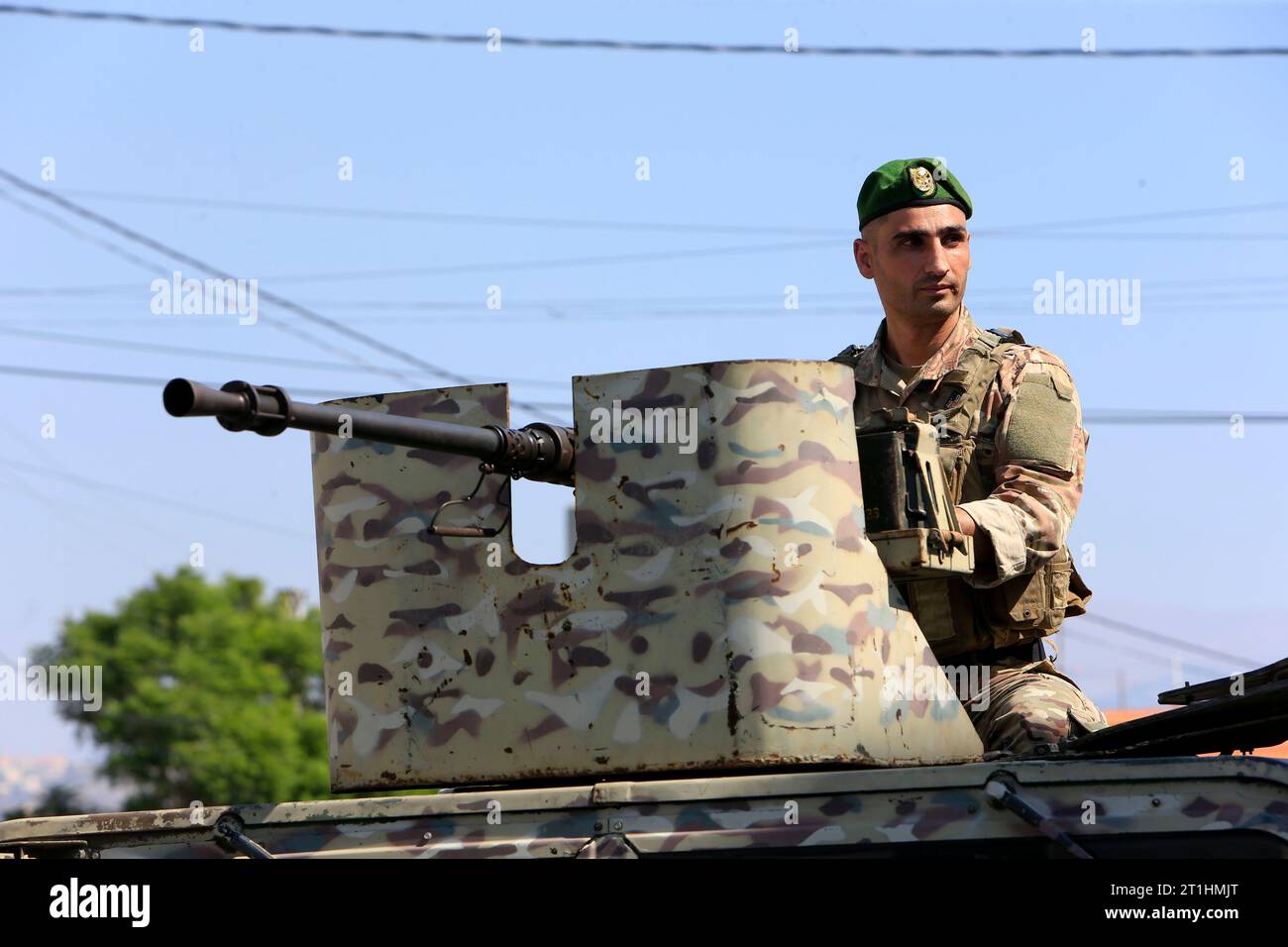 Khiam. 13th Oct, 2023. A Lebanese soldier patrols in the Lebanese town ...