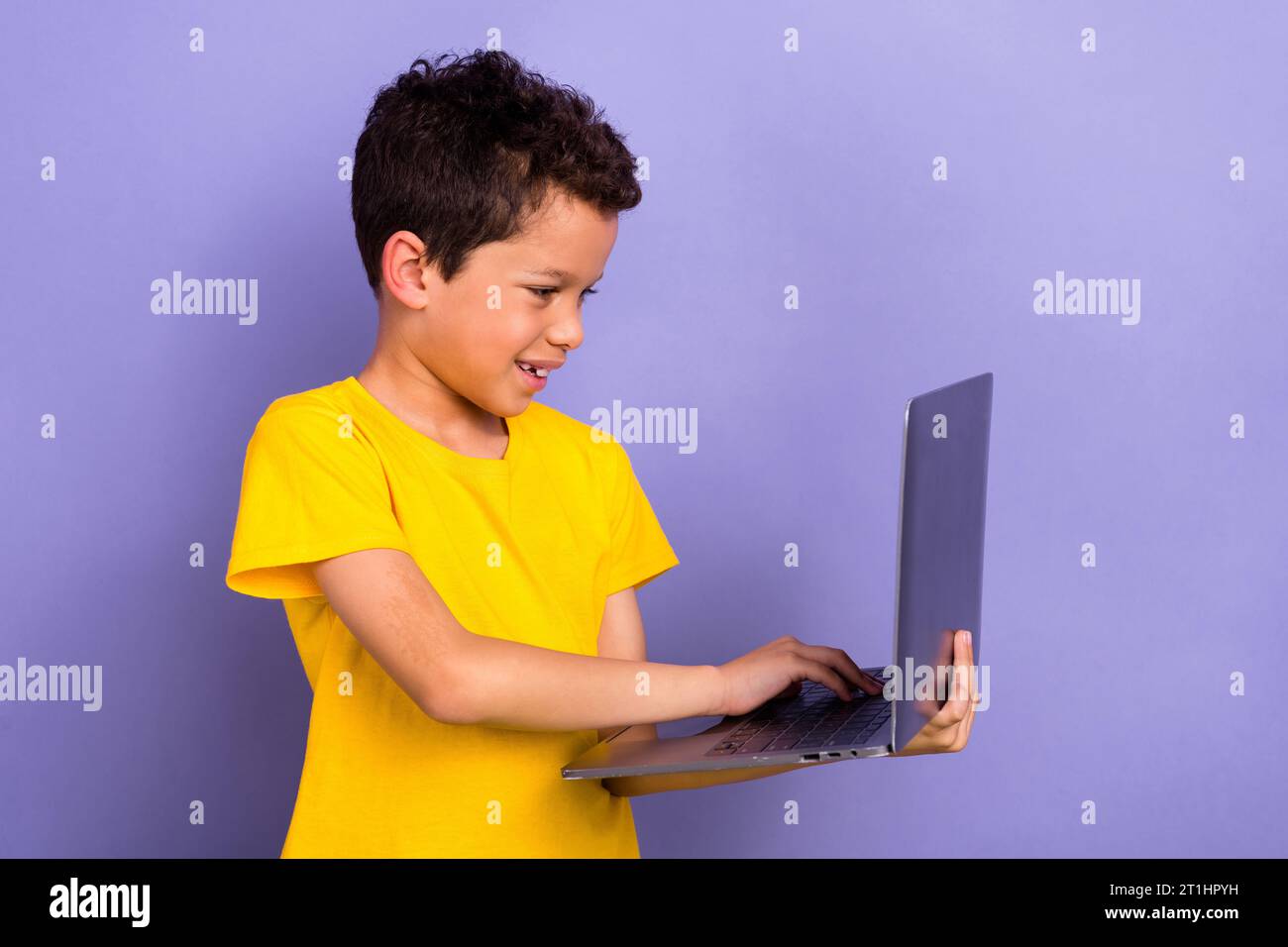 Photo of nice cute diligent pupil wear yellow trendy clothes doing ...