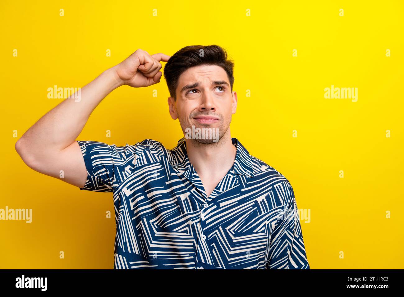 Portrait of minded doubtful person arm finger scratch head look empty ...