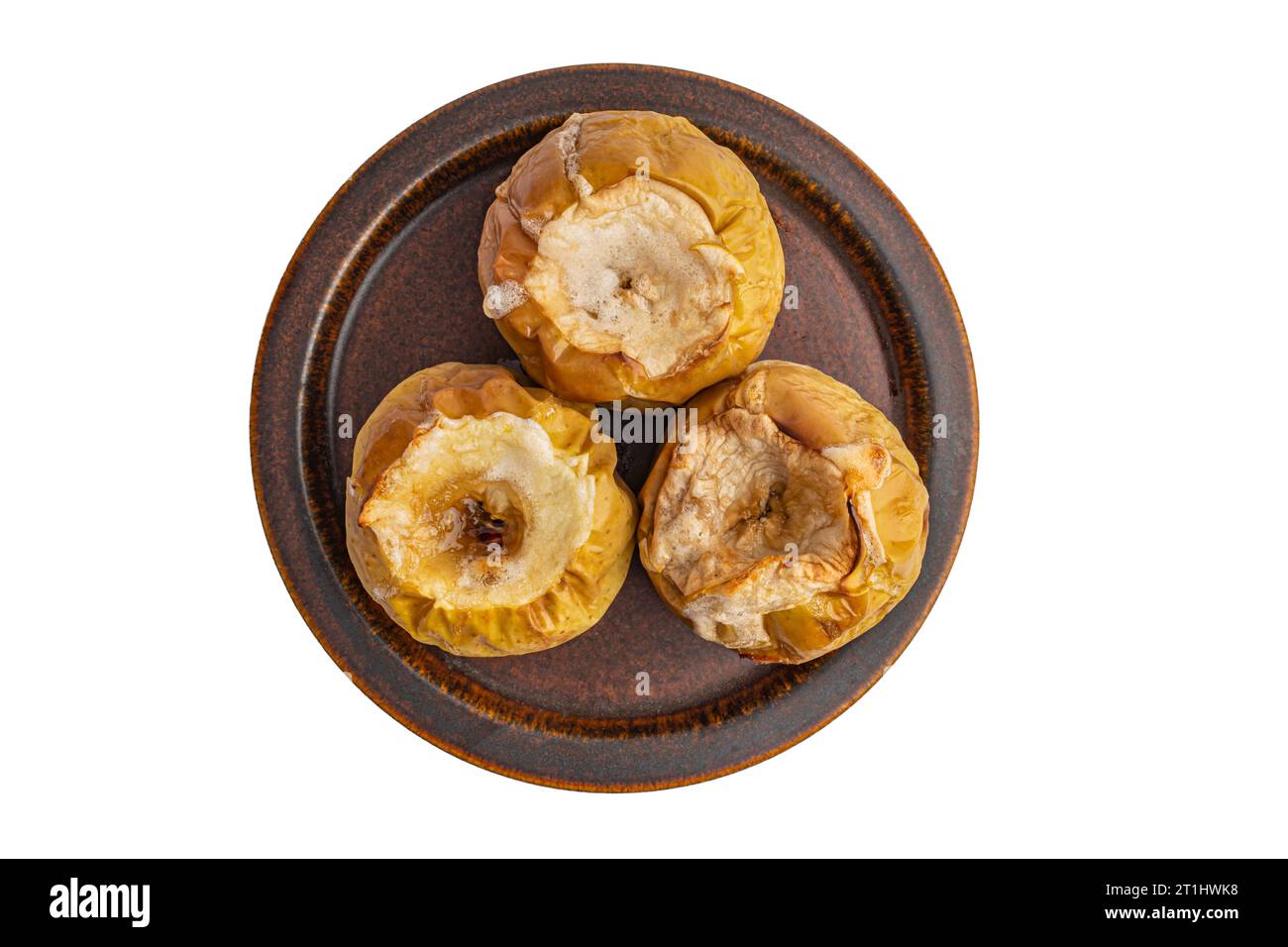 baked apples on a ceramic brown plate Stock Photo - Alamy