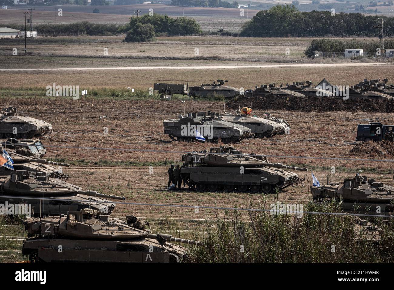 Zikim, Israel. 14th Oct, 2023. Israeli tanks and soldiers are seen at a ...