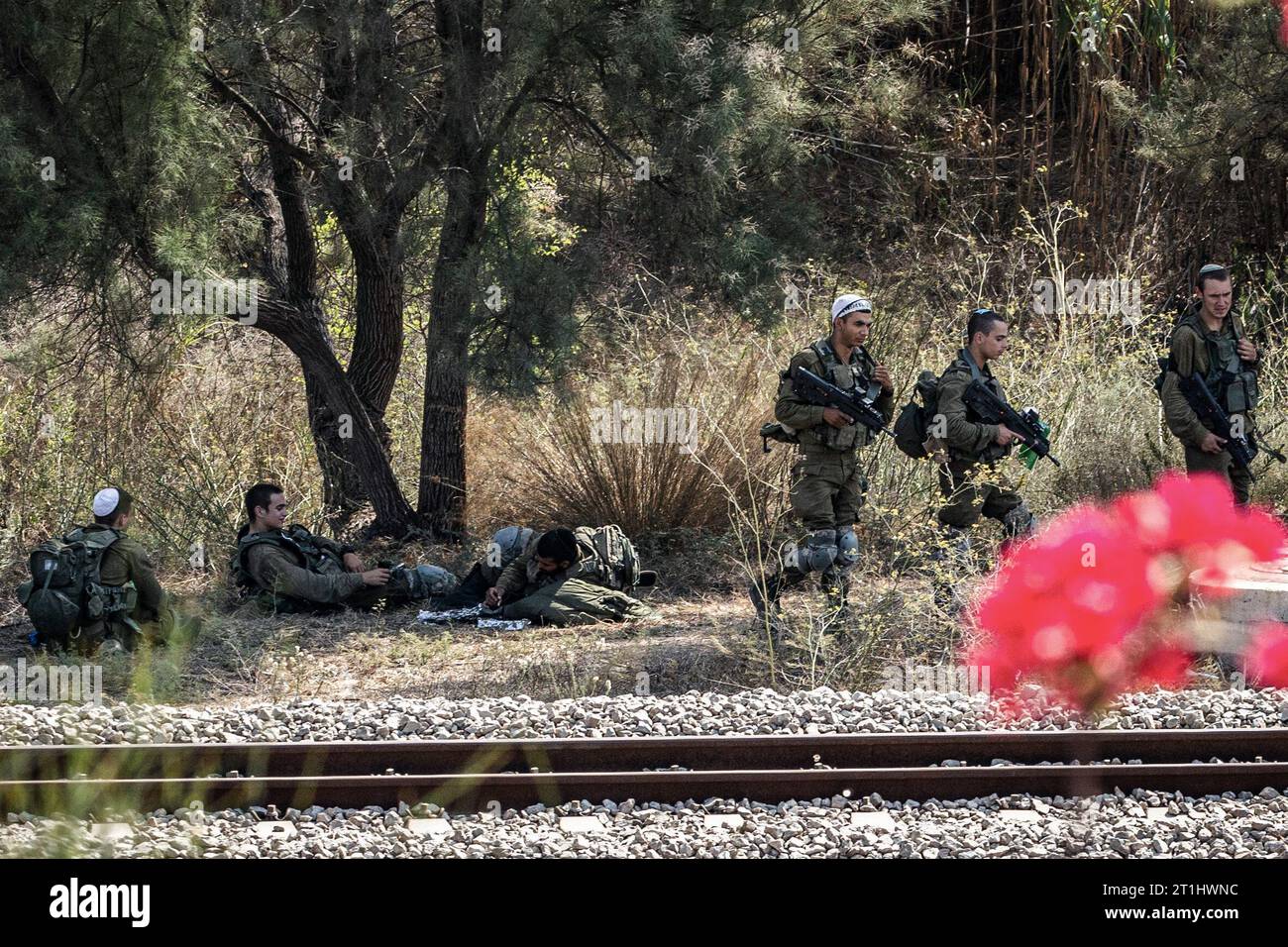 Zikim, Israel. 14th Oct, 2023. Israeli soldiers are seen near the ...