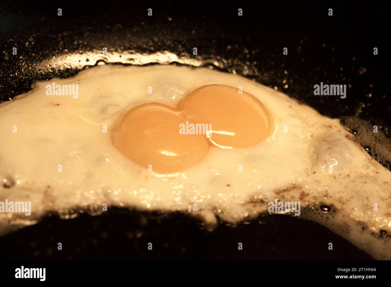 FRIED EGG with double yolks Stock Photo - Alamy